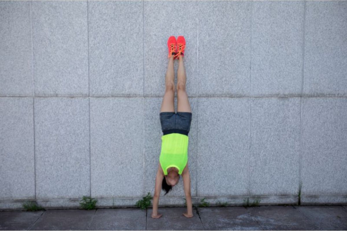 How To Do A Wall Handstand: 6 Tips To Progress Your Performance